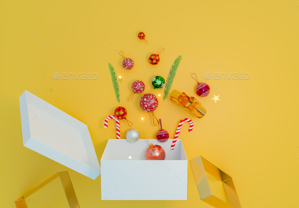 open christmas present box on yellow babkground Stock Photo by tridsanu