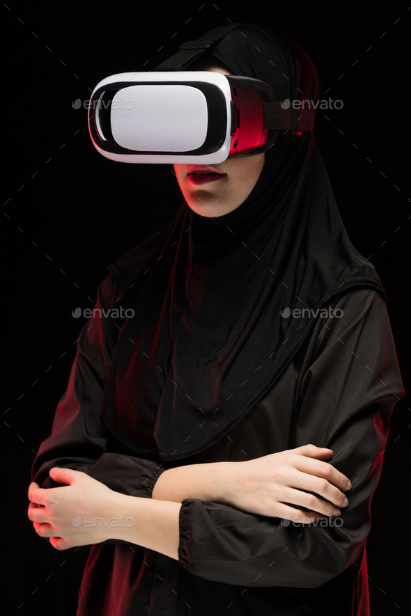 Portrait of beautiful smart young muslim woman wearing black hijab ...