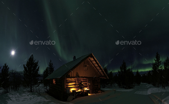 Rustic log cabin with full moon and aurora borealis Stock Photo by ...