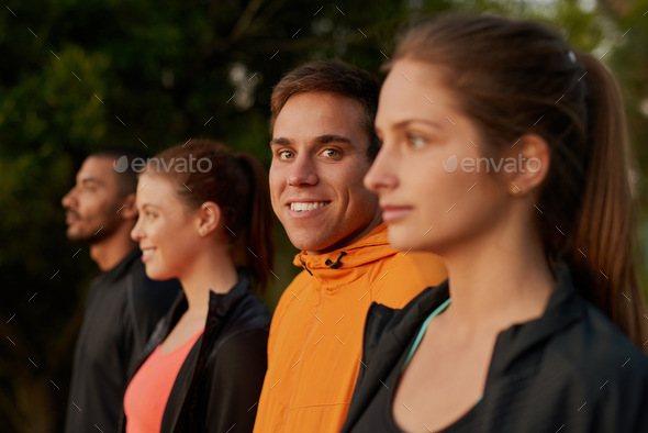 Cropped shot of a fitness group standing in a row Stock Photo by ...