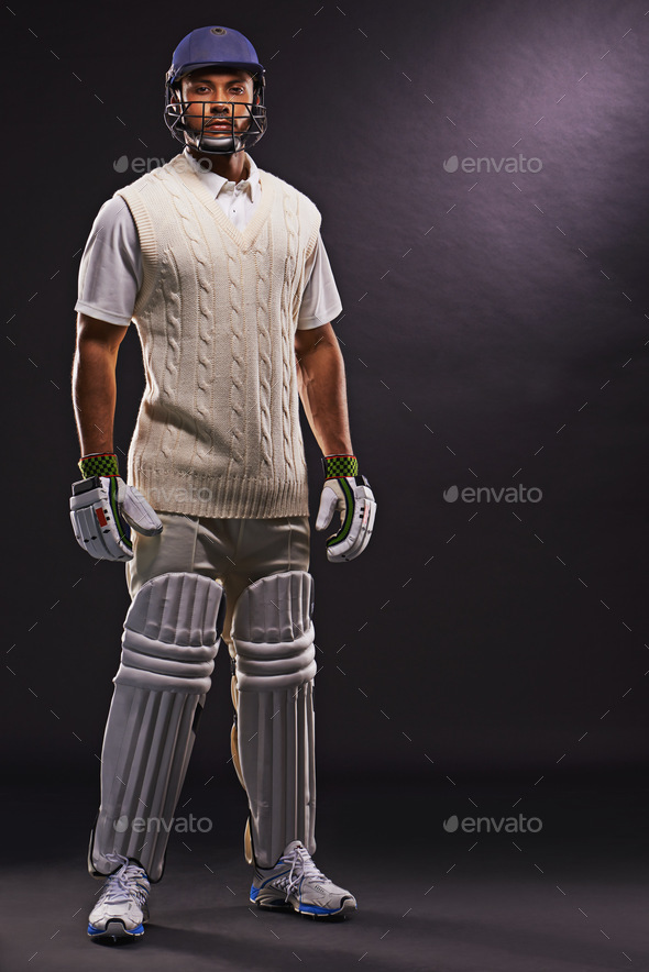 Ready to hit the pitch. A cropped shot of an ethnic young man in ...