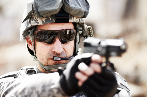 Hes a force of focus. Closeup head and shoulders shot of a soldier ...