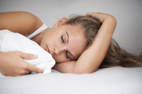 Sleeping beauty. A beautiful young woman sleeping peacefully. Stock ...