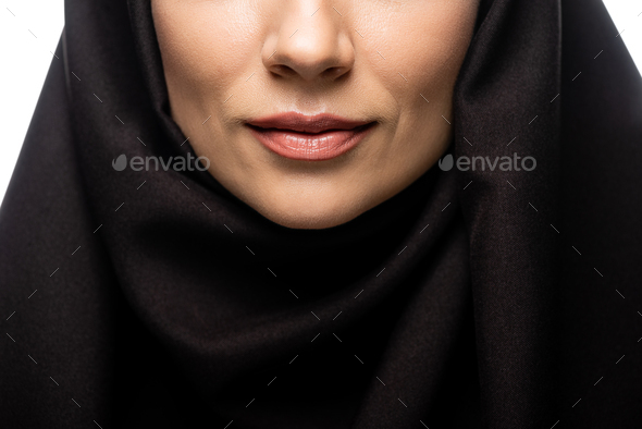 cropped view of beautiful young Muslim woman lips isolated on white ...