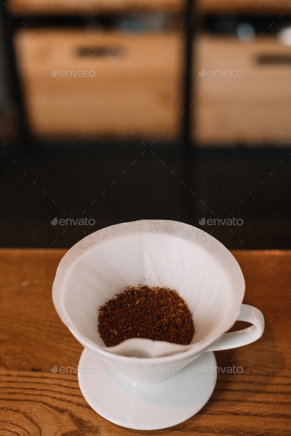filtered coffee preparation using cup and paper filter Stock Photo by ...