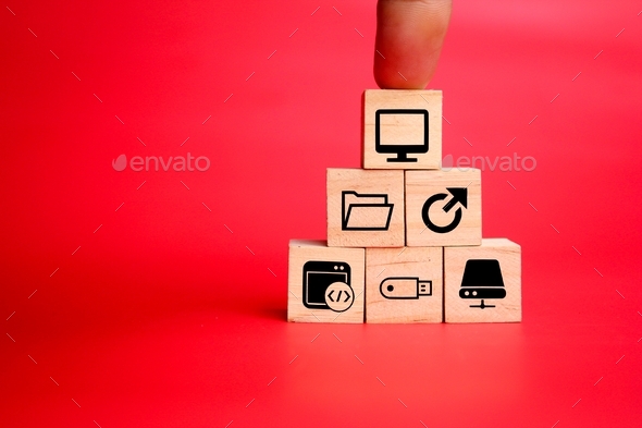 wooden cube with computer icons and components for computers Stock ...