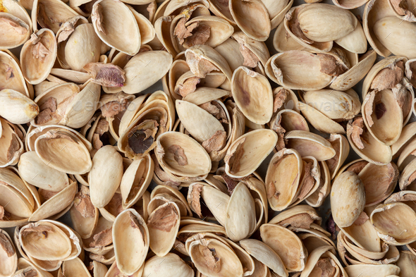 Pile of pistachios shells as background. Texture Stock Photo by lma_stock