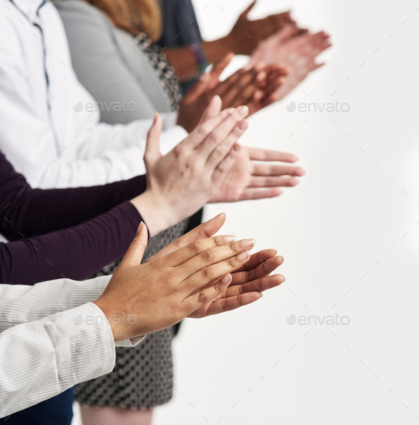 Well done. Shot of a group of people clapping their hands together ...