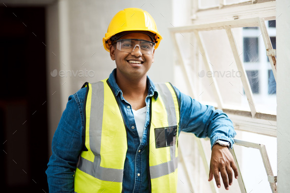 Shot of a engineer wearing protective gear on a construction site Stock ...