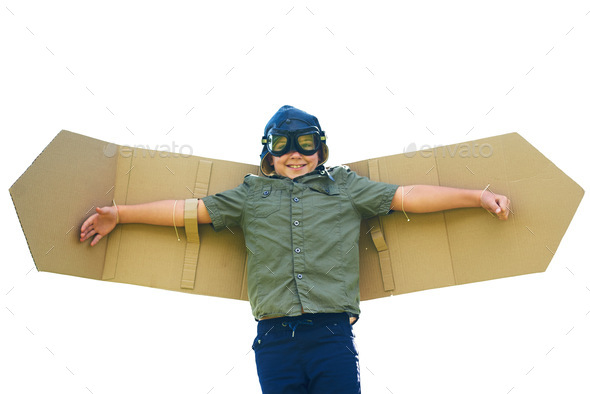 Shot of a playful little boy pretending to be an airplane with a pair ...