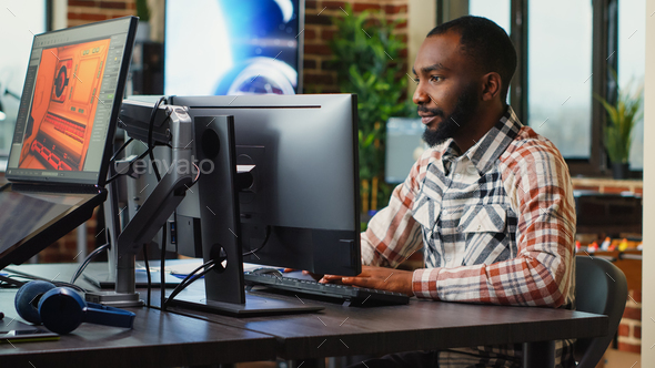 Multiethnic group of employees creating 3d project at office ...