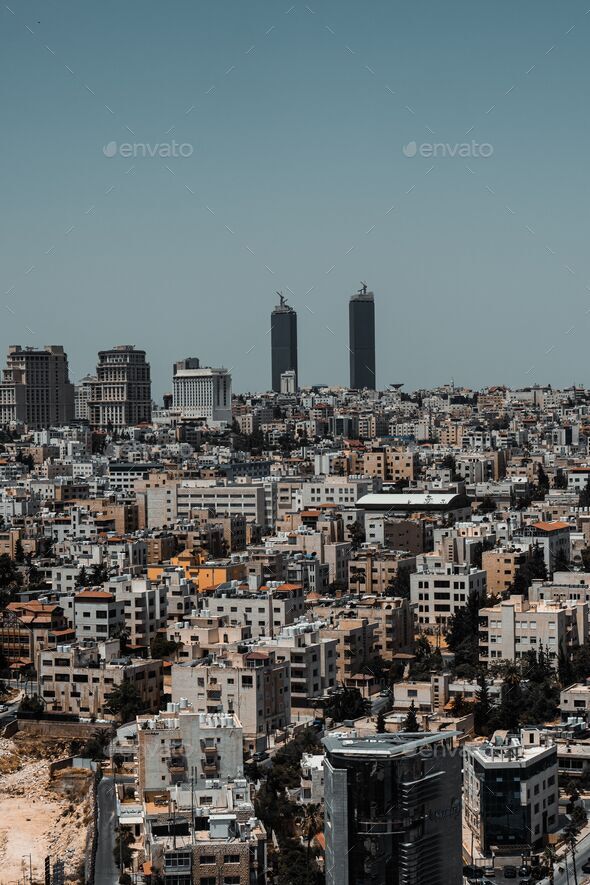Vertical aerial view of the buildings of Amman during a cloudy day in ...
