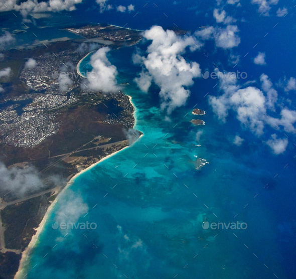 View of the land and sea from the space height Stock Photo by wirestock