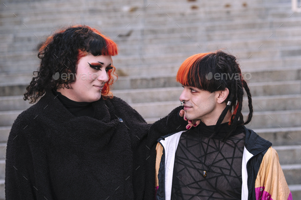 Couple of a boy with a transgender girl with an urban look. Stock Photo ...