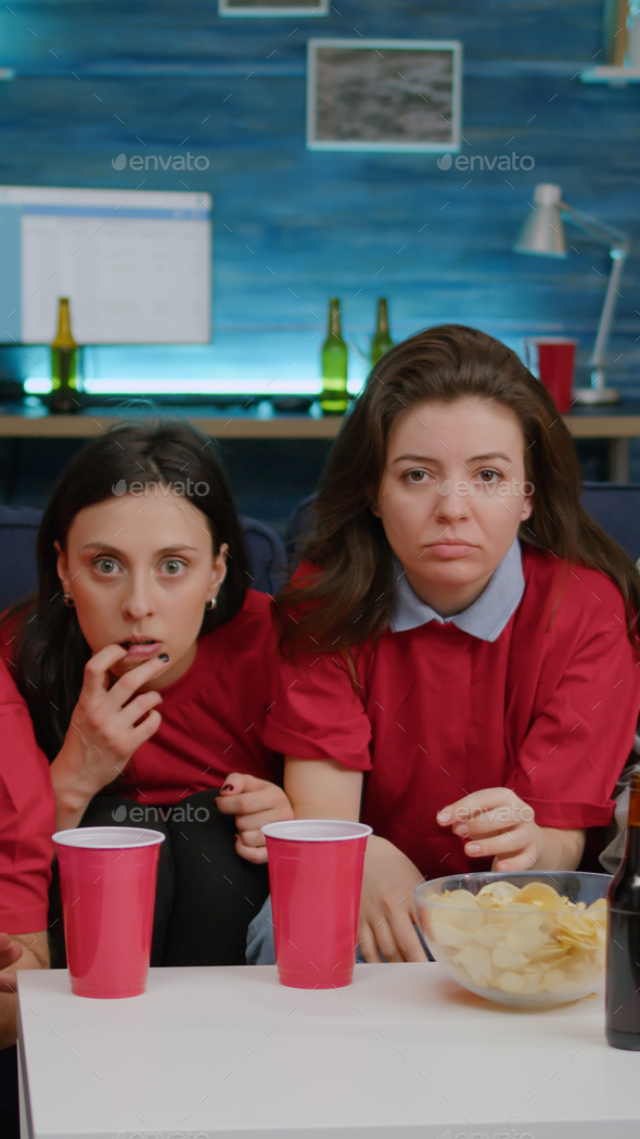 Upset group of multi-ethnic sport fans frustreated after football team ...