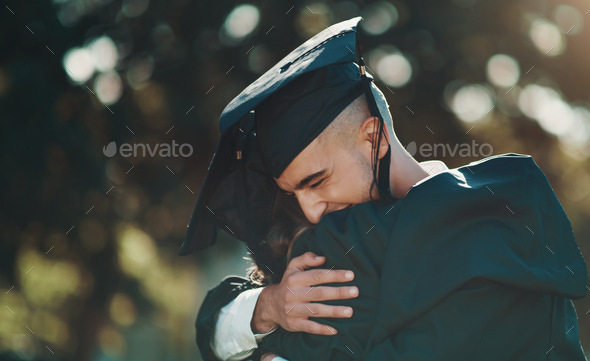 Shot of two students sharing a hug on graduation day Stock Photo by ...