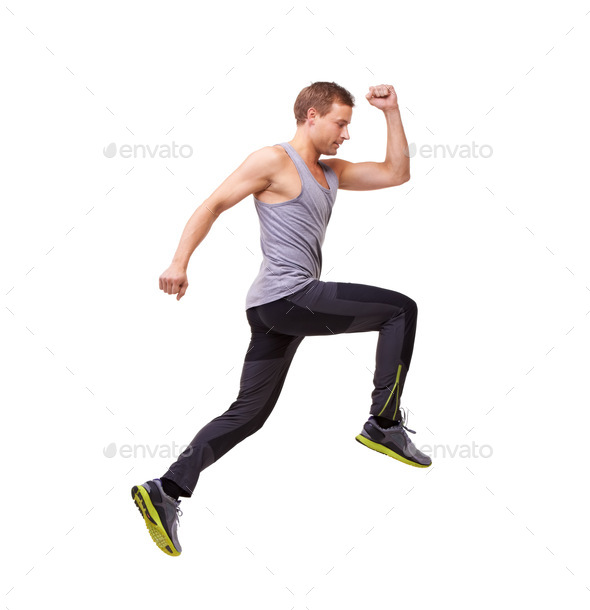 Sideways studio shot of a man running across the frame isolated on ...