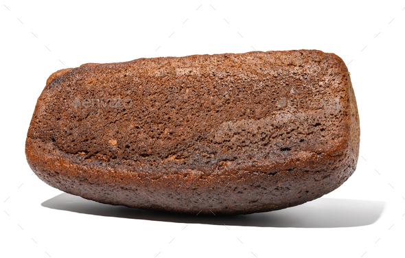 Baked rye flour bread in the shape of a brick on a white isolated ...