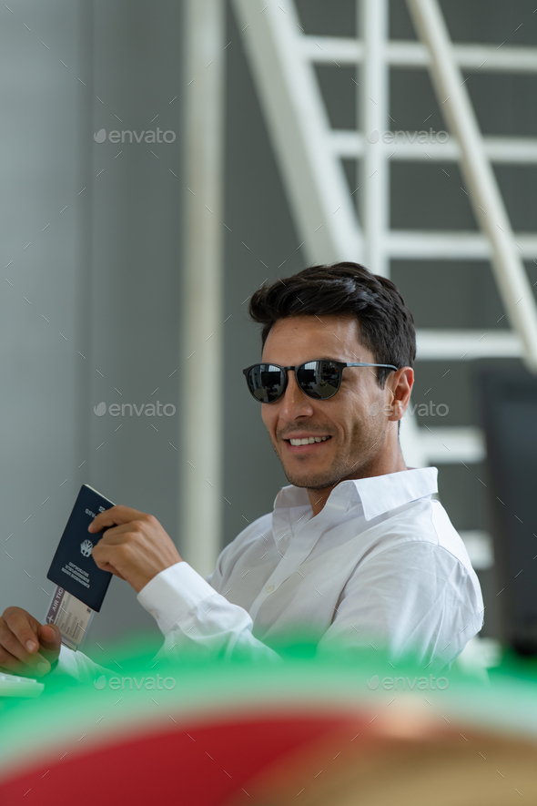 Two office workers searching for tourist attractions, booking tickets ...