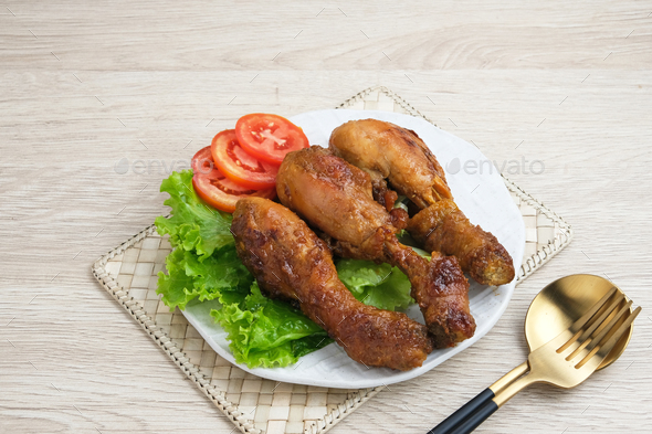 Grilled Chicken or Ayam Bakar with herbs and spices. Stock Photo by ...