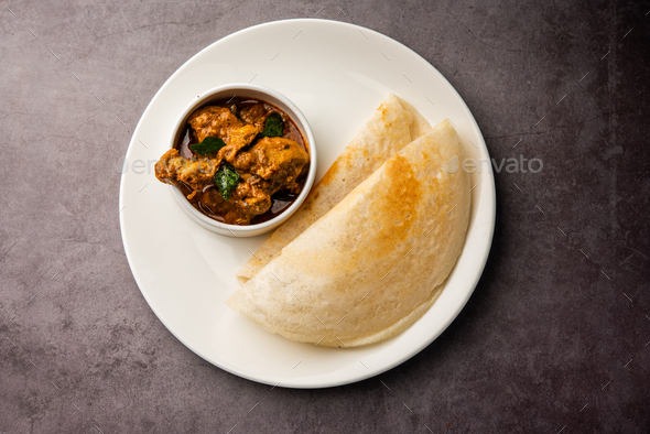 Chicken curry dosa is a south indian non vegetarian recipe Stock Photo ...