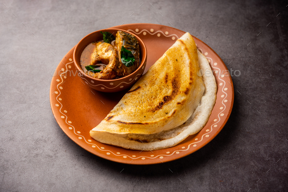 dosa with with fish curry from south Indian non vegetarian cuisine ...