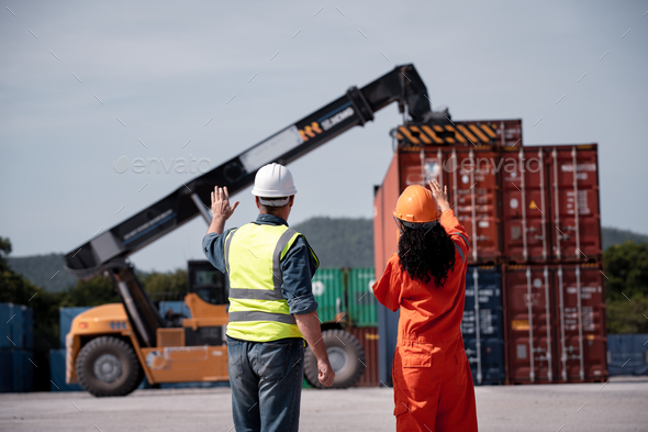 Engineer worker under working with fork lift container truck is ...