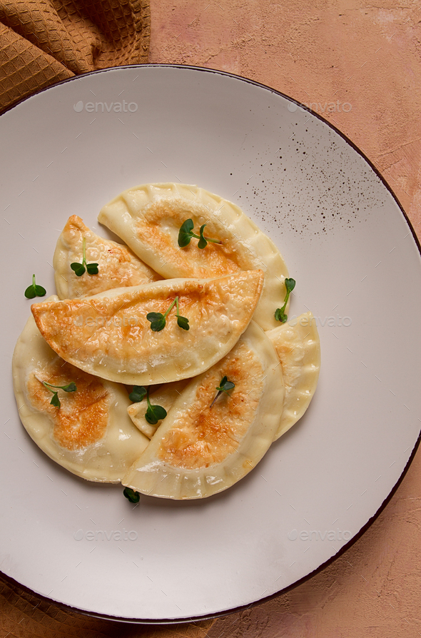 Pierogi, a traditional dish of Polish cuisine, dumplings, top view ...