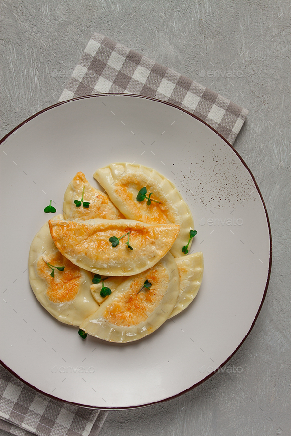 Pierogi, a traditional dish of Polish cuisine, dumplings, top view ...