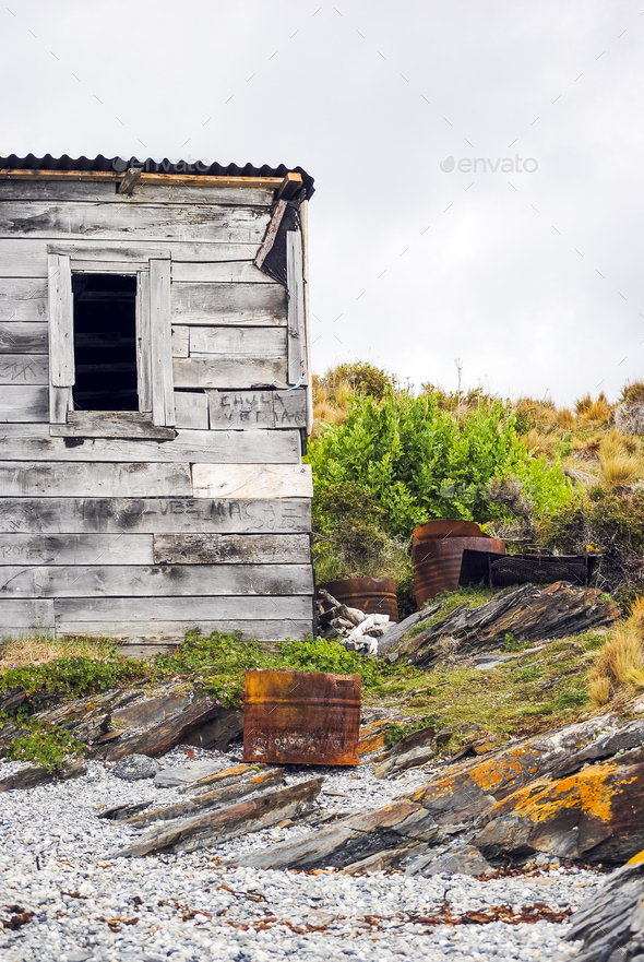 Wooden shack with sheet roof and no door Stock Photo by valevenezia