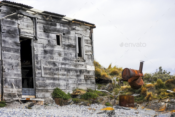 Wooden shack with sheet roof and no door Stock Photo by valevenezia