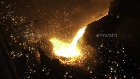 Liquid metal from blast furnace. Liquid iron from ladle in the ...