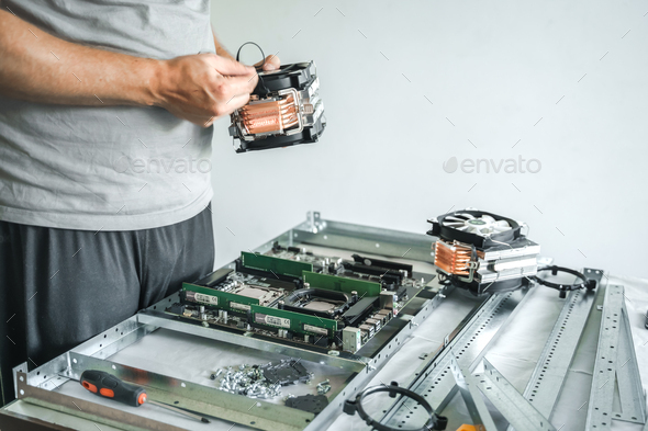 Man engineer,collector.Independent self computer assembly. Mounting in sockets processor,random ...