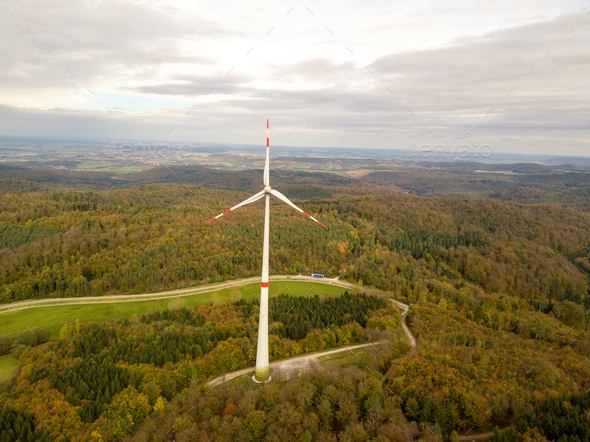 Shot of a wind turbine in a rainforest Stock Photo by wirestock | PhotoDune