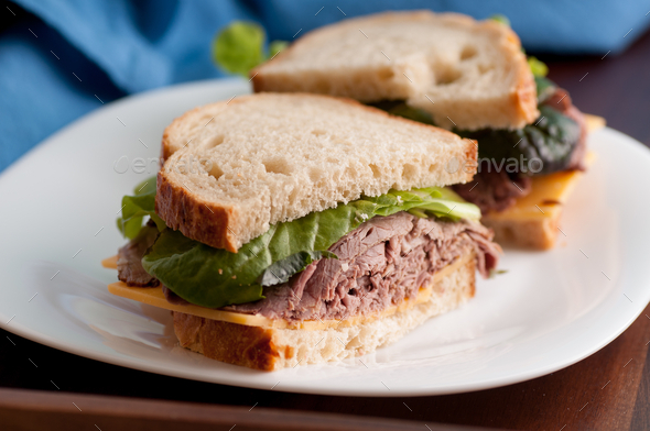 deli style roast beef sandwich Stock Photo by wirestock | PhotoDune