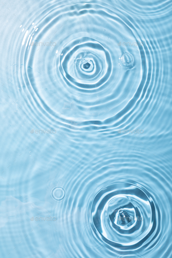 Vertical shot of water ripples on the surface of the water Stock Photo ...