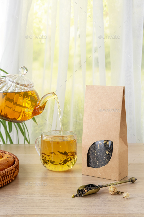 Organic tea branding and packaging mockup. Jasmine green tea in glass ...