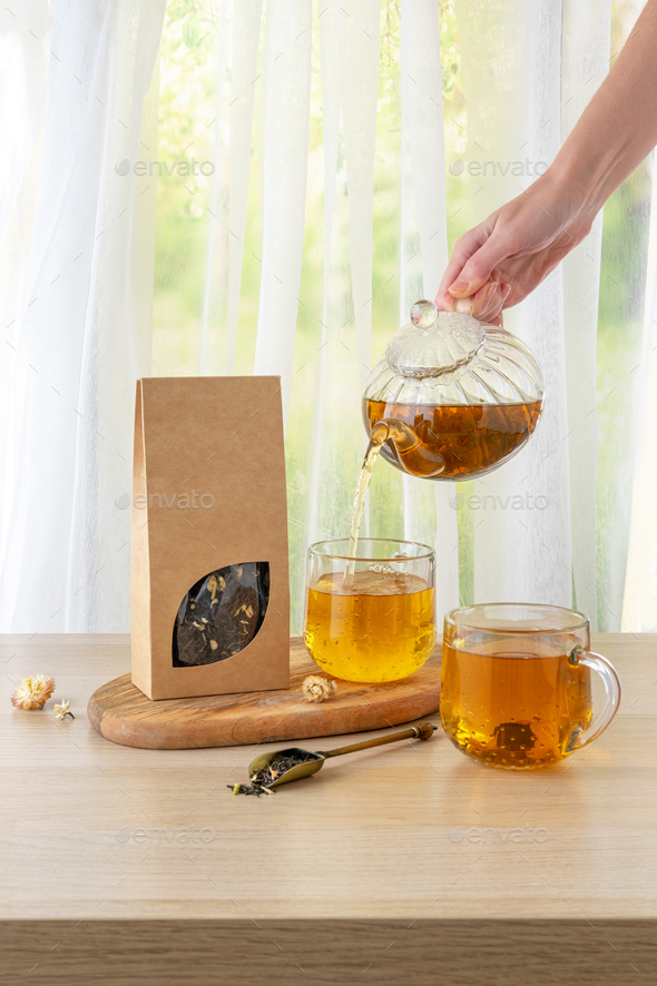 Organic tea branding and packaging mockup. Jasmine green tea in glass ...