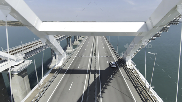 Top view of long bridge highway across sea. Action. Beautiful landscape ...