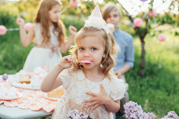 Summer outdoor kids birthday party. Group of happy Children celebrating ...