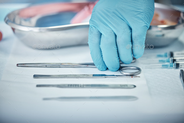 Surgery, tools and doctor hand with health, glove for safety and ...