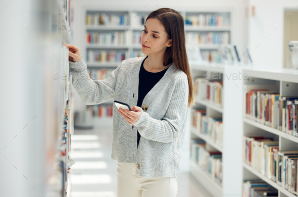 Phone, library bookshelf and student search for books on mobile app at ...