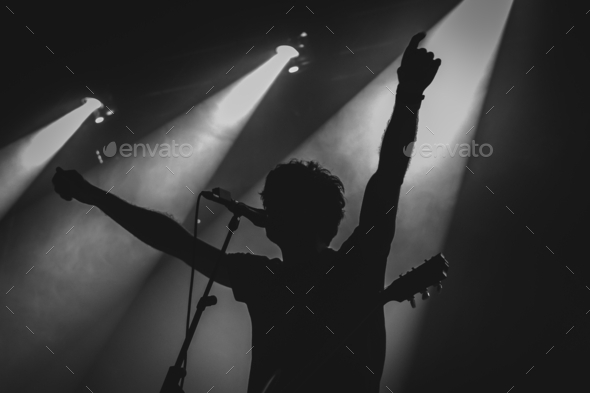 Shadow of the singer. Stock Photo by wirestock | PhotoDune