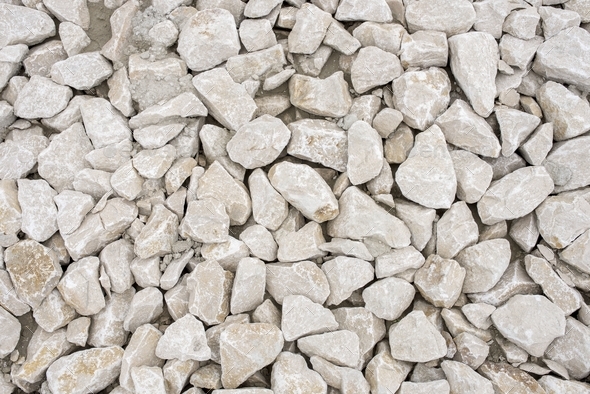 Overhead of a pile of white limestone rocks - great for industrial ...