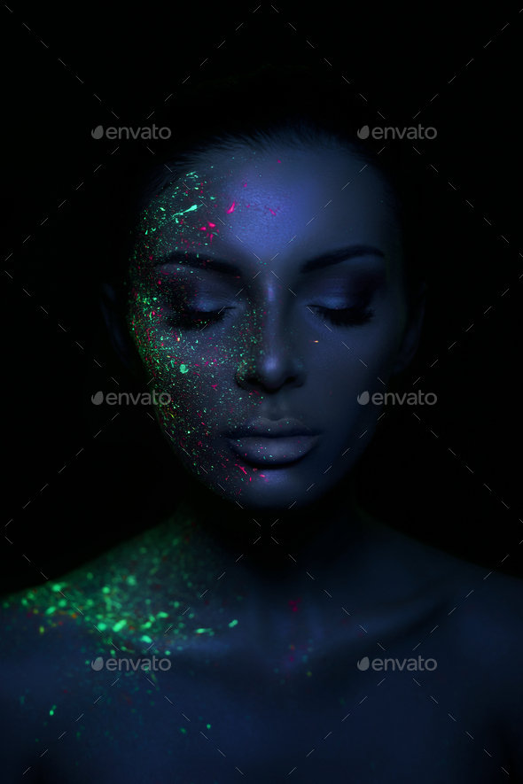 Fashion model woman in neon light bright fluorescent makeup, drop on ...