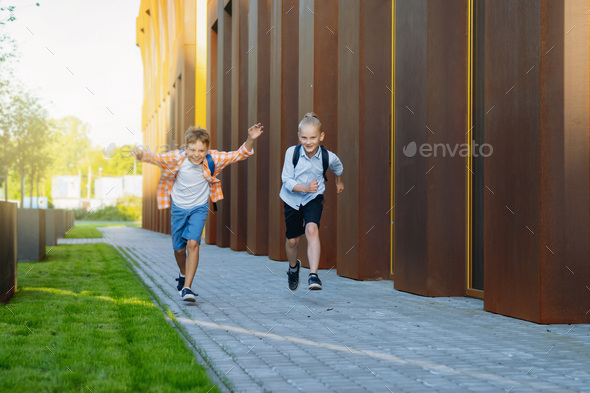 children go to school. Begining of academic year Stock Photo by uraneva