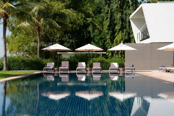 Beautiful scenery of the pool surroundings reflecting in the water in ...