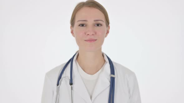 Female Doctor Shaking Head As Yes Sign on White Background, Stock Footage