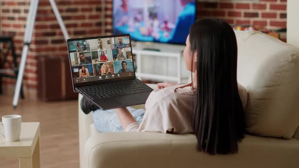 Asian Person with Portable Computer Working Remotely While Having ...