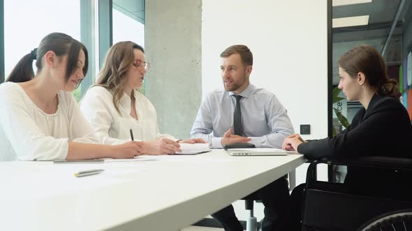 Diverse Group of Work Colleagues Talking at Office Meeting One in ...